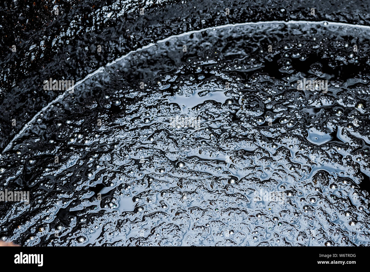 crude oil surface background textured. Pollution with oil products ...