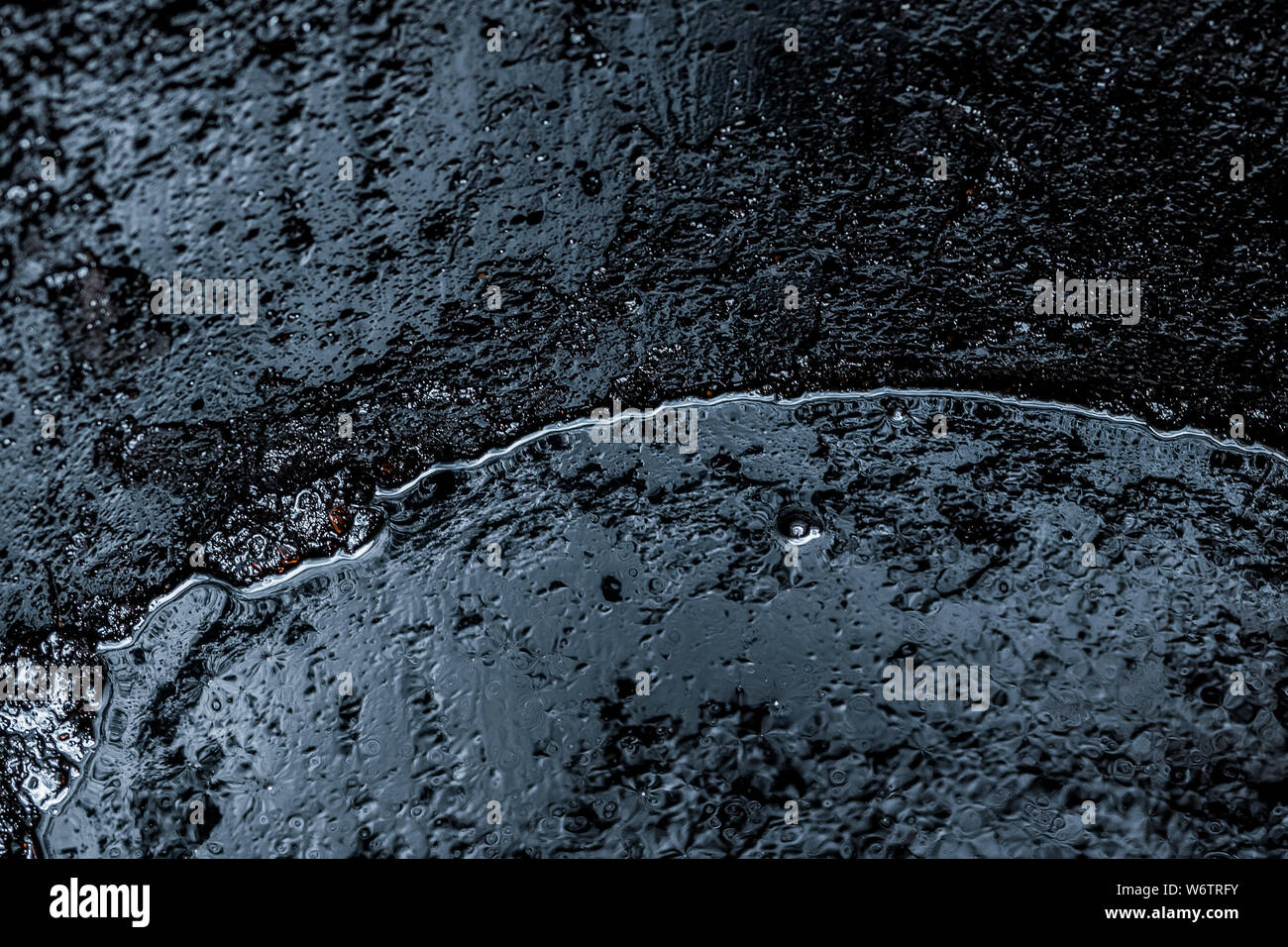 crude oil surface background textured. Pollution with oil products ...
