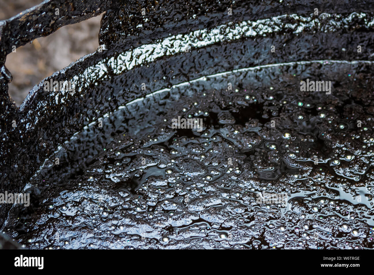 crude oil surface background textured. Pollution with oil products ...