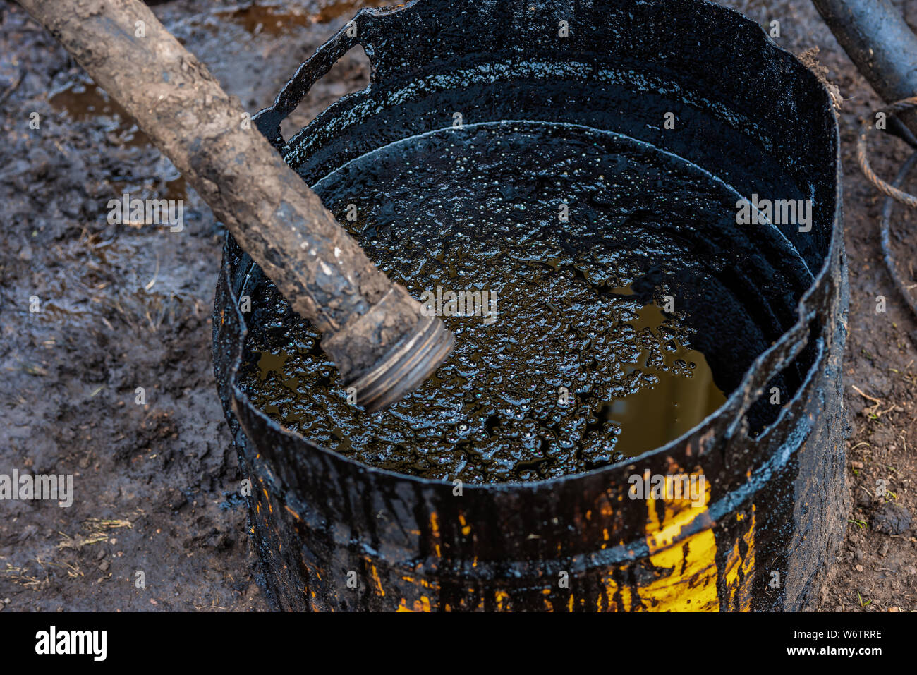 Dirty Oil spill on floor. Oil pollution Stock Photo - Alamy