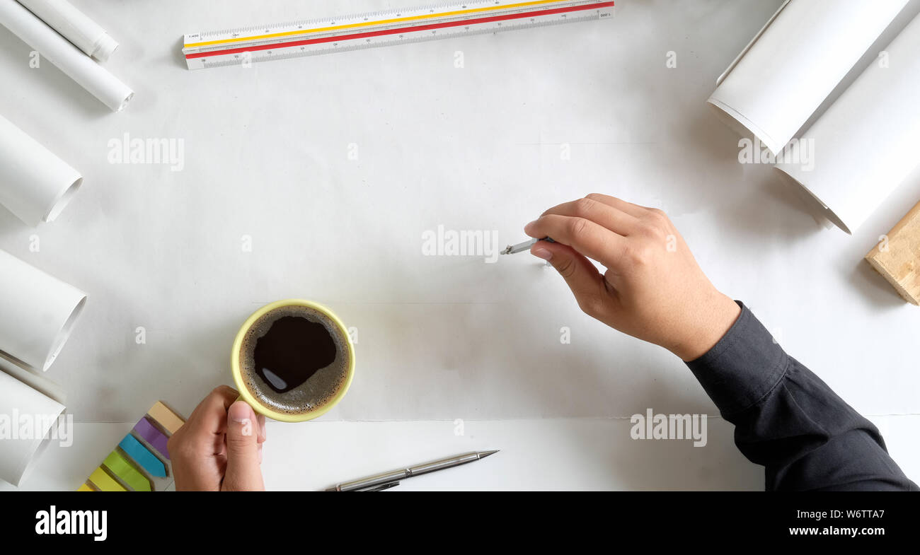 Architecture drawing on desk office. Top view shot Stock Photo - Alamy