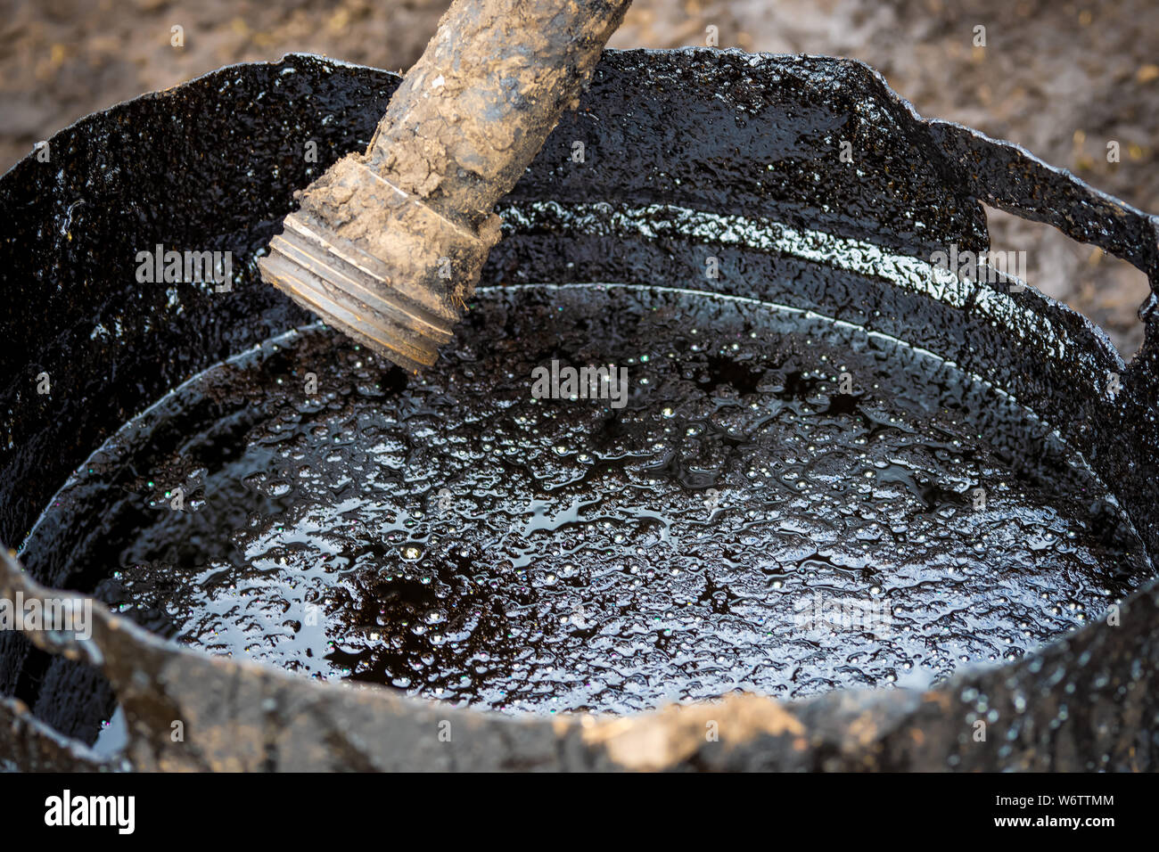 Pollution with oil products. crude oil contaminate to environment Stock ...
