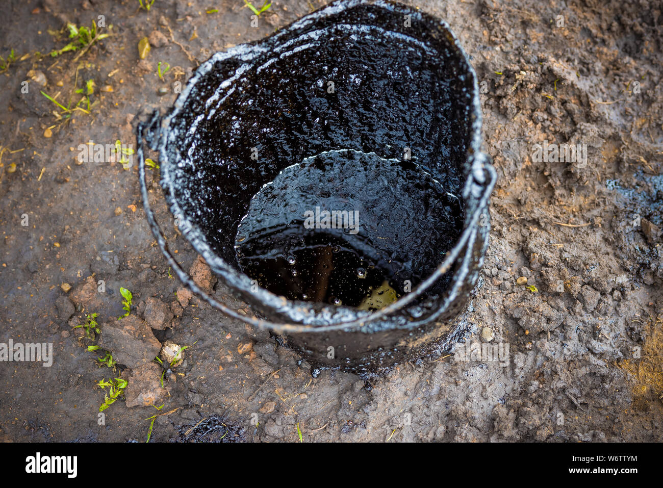 Pollution with oil products. crude oil contaminate to environment Stock ...