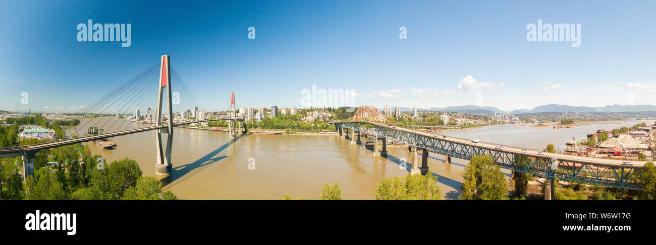 Aerial panoramic view of Pattullo Bridge and Skytrain Bridge over the ...
