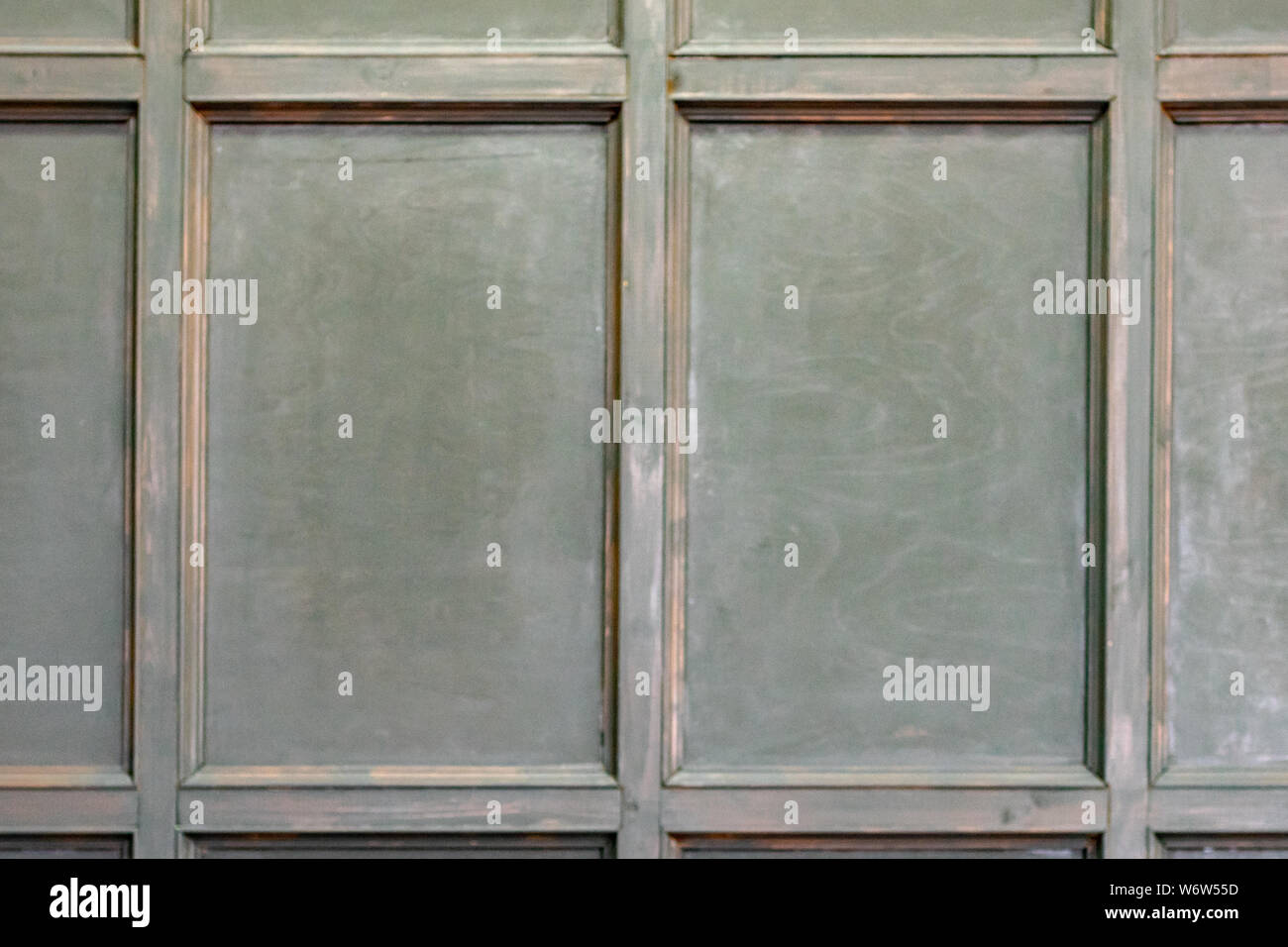 Old medieval wood paneling covering a wall in a historical country ...