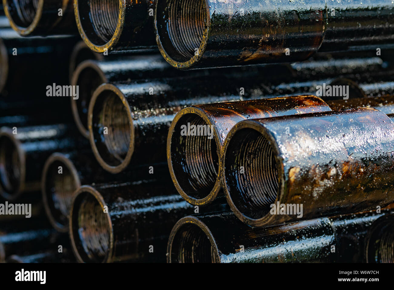 Drillpipe on Oil Rig Pipe Deck. Oil and gas industry. Work of oil pump ...
