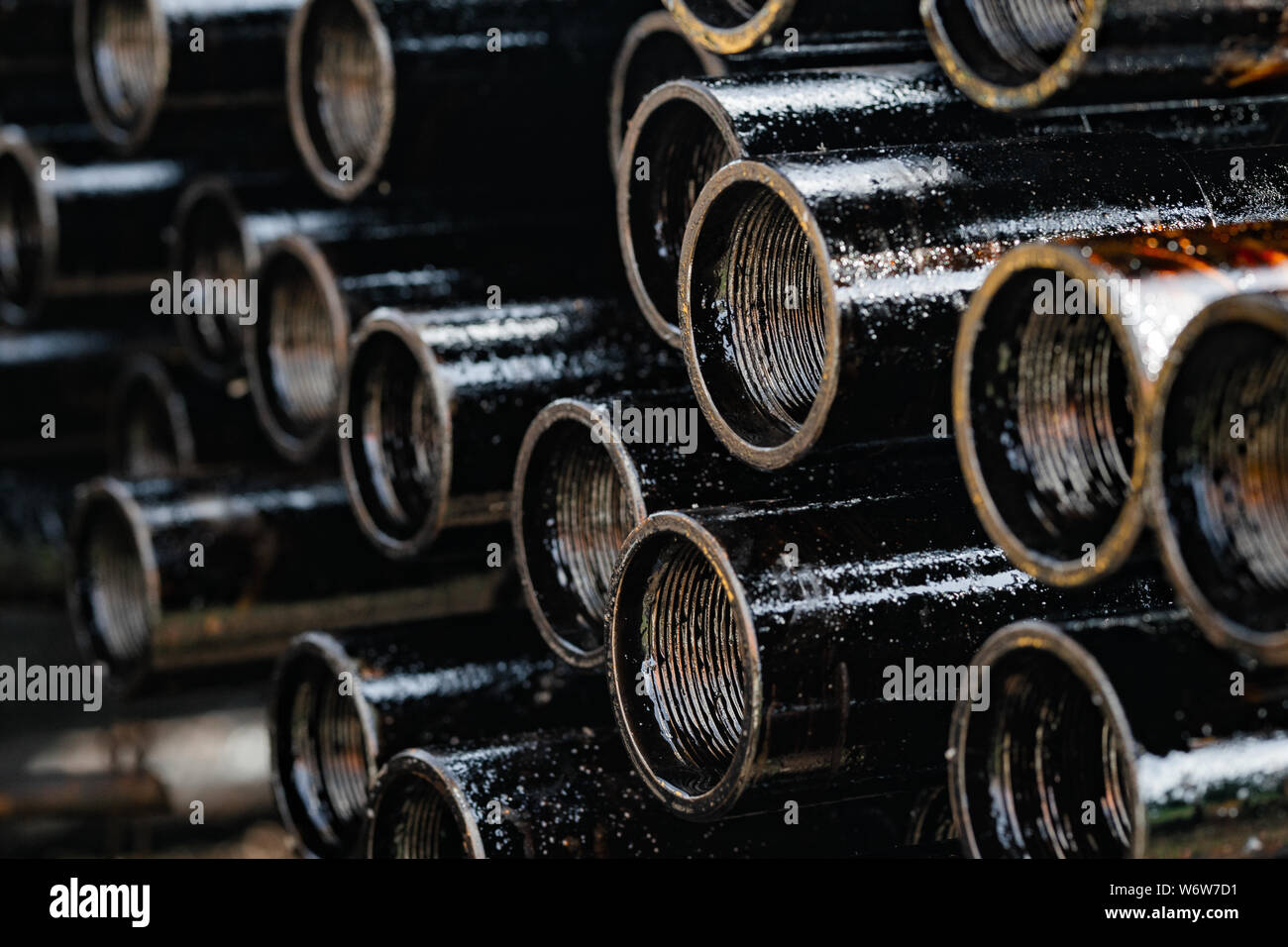 Drillpipe on Oil Rig Pipe Deck. Oil and gas industry. Work of oil pump ...