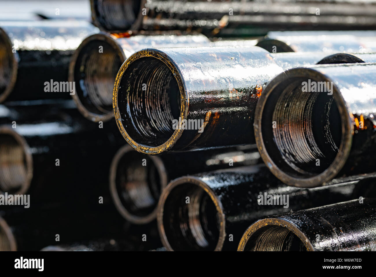 Drillpipe on Oil Rig Pipe Deck. Oil and gas industry. Work of oil pump ...