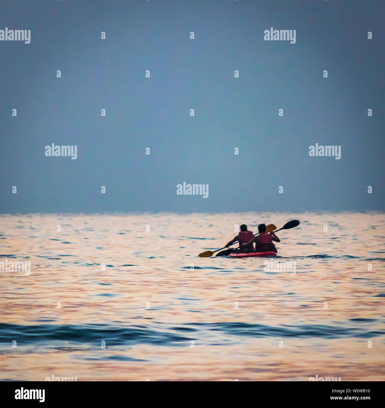 kayak in the middle of the sea. young man kayaking India Goa Stock ...