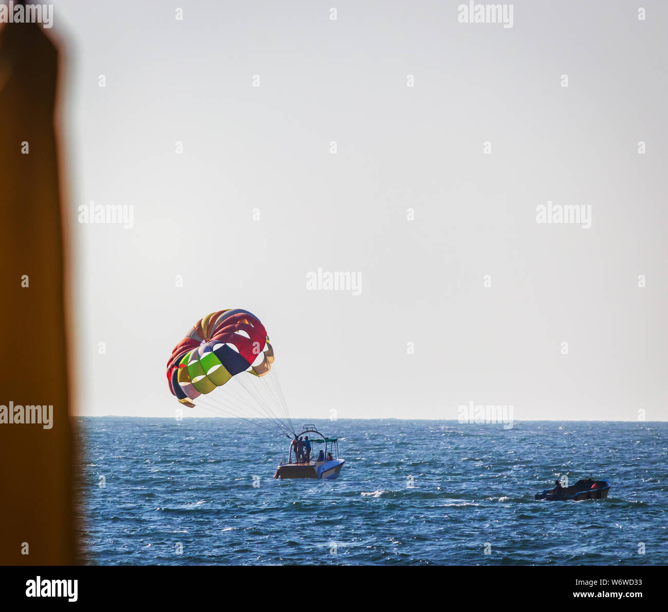 Paragliding on the beach of Arambol in Goa,India Stock Photo - Alamy