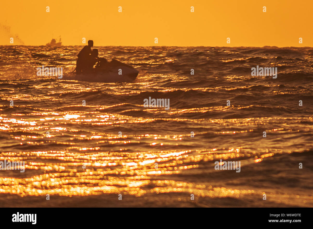 water sports in Goa India. Motorboat in action for tourist riding ...