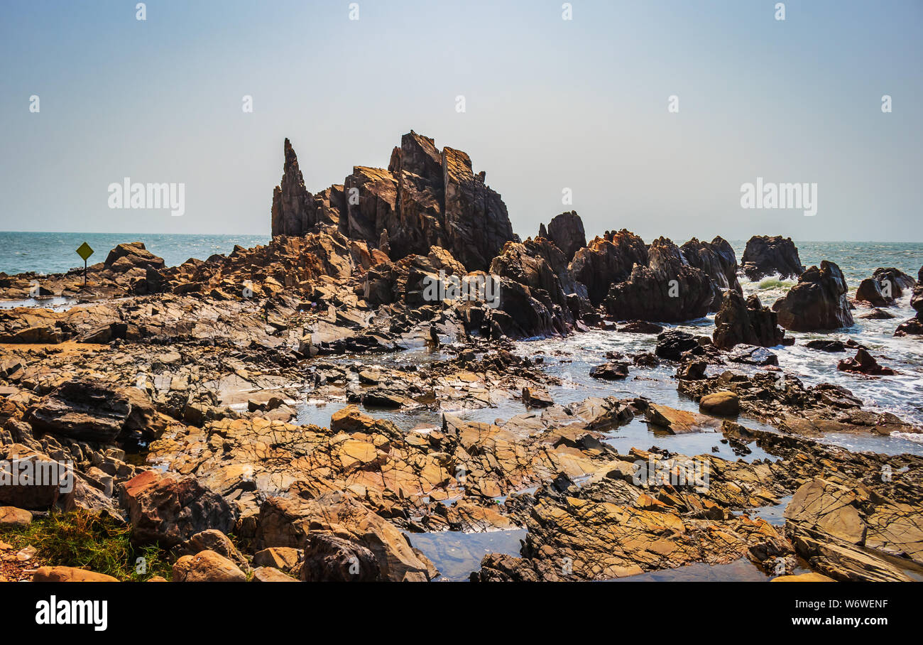 Rocks and stones on the Arambol beach in North Goa, India. Best holiday ...