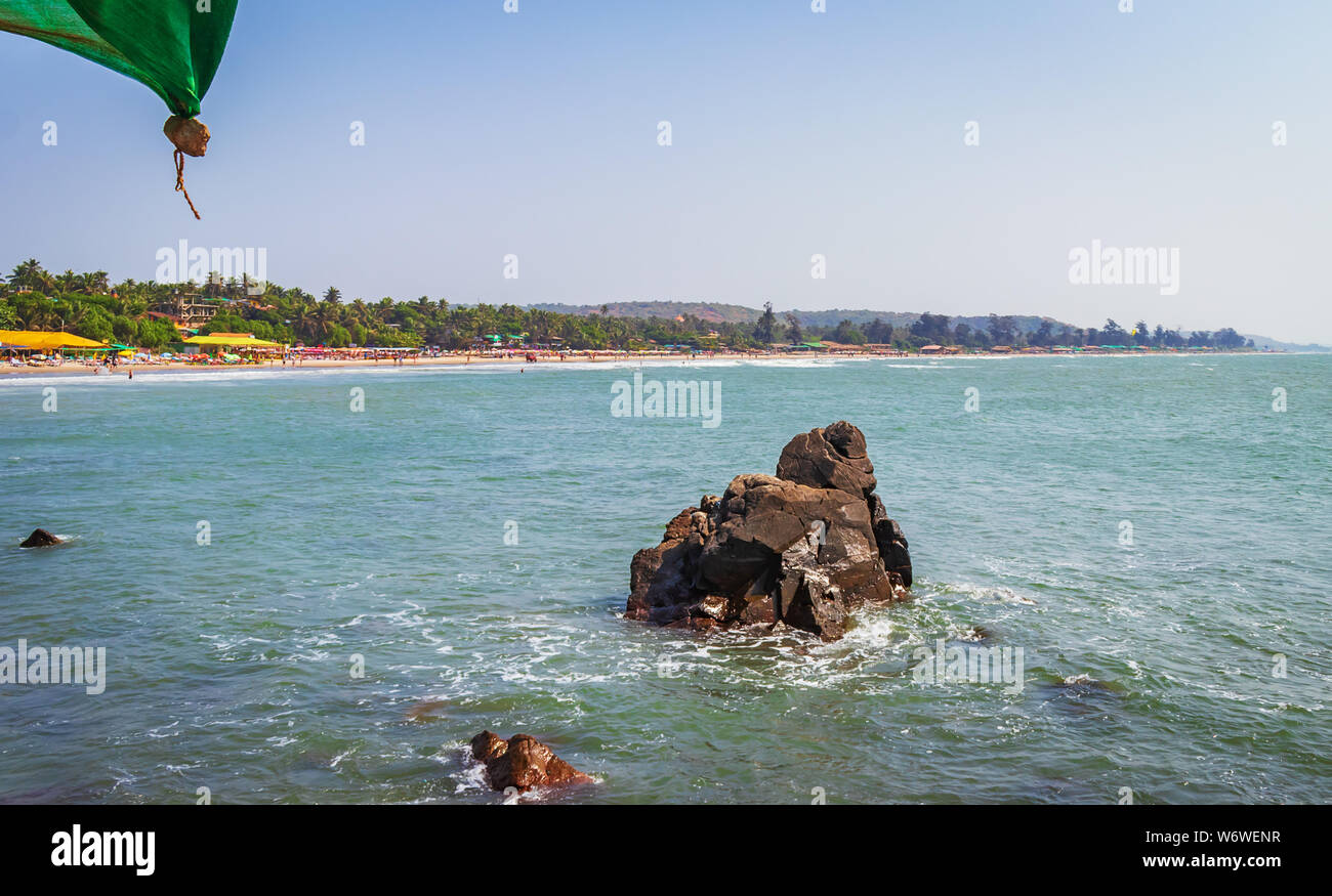 Rocks and stones on the Arambol beach in North Goa, India. Best holiday ...