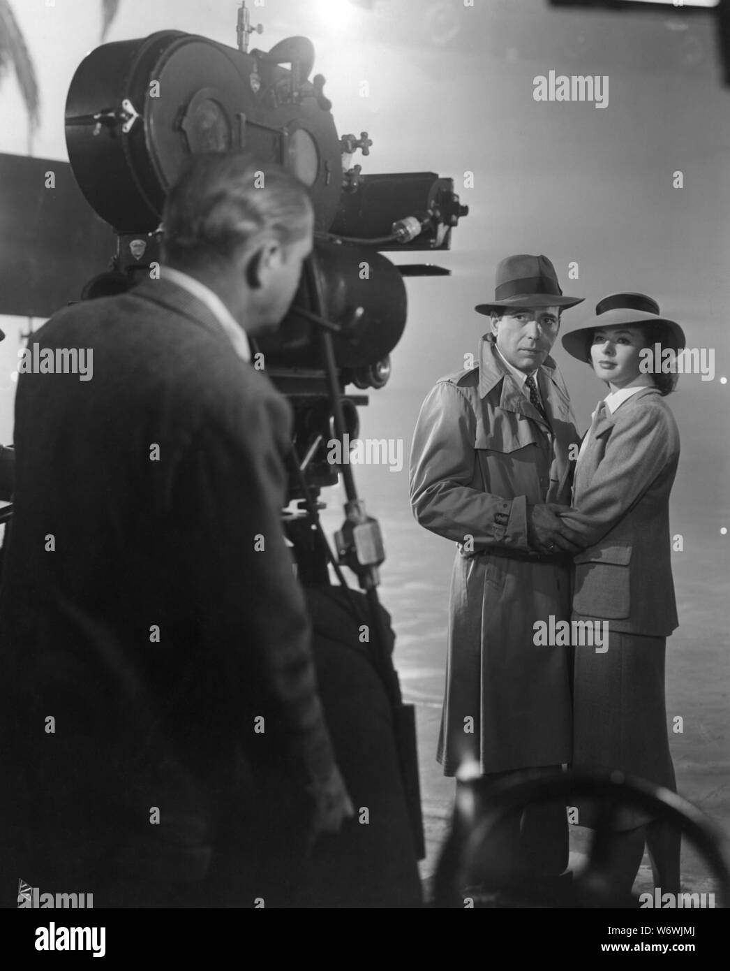 HUMPHREY BOGART and INGRID BERGMAN with director of photography ARTHUR ...