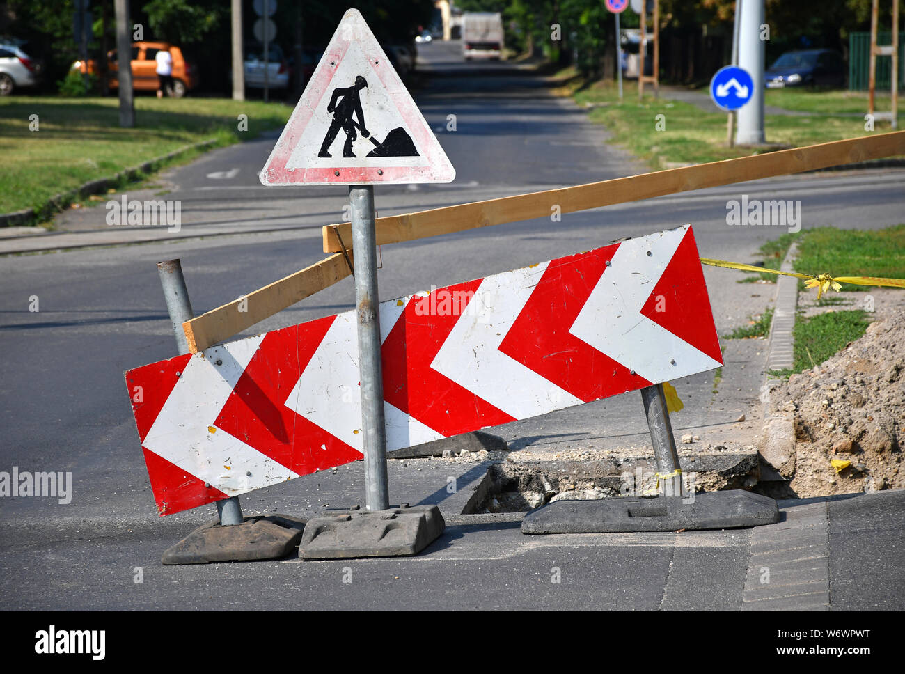 Road works and road barrier signs on the street Stock Photo - Alamy