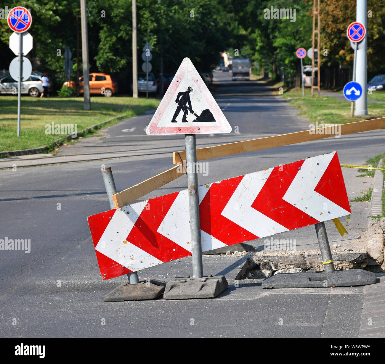Road works and road barrier signs on the street Stock Photo - Alamy