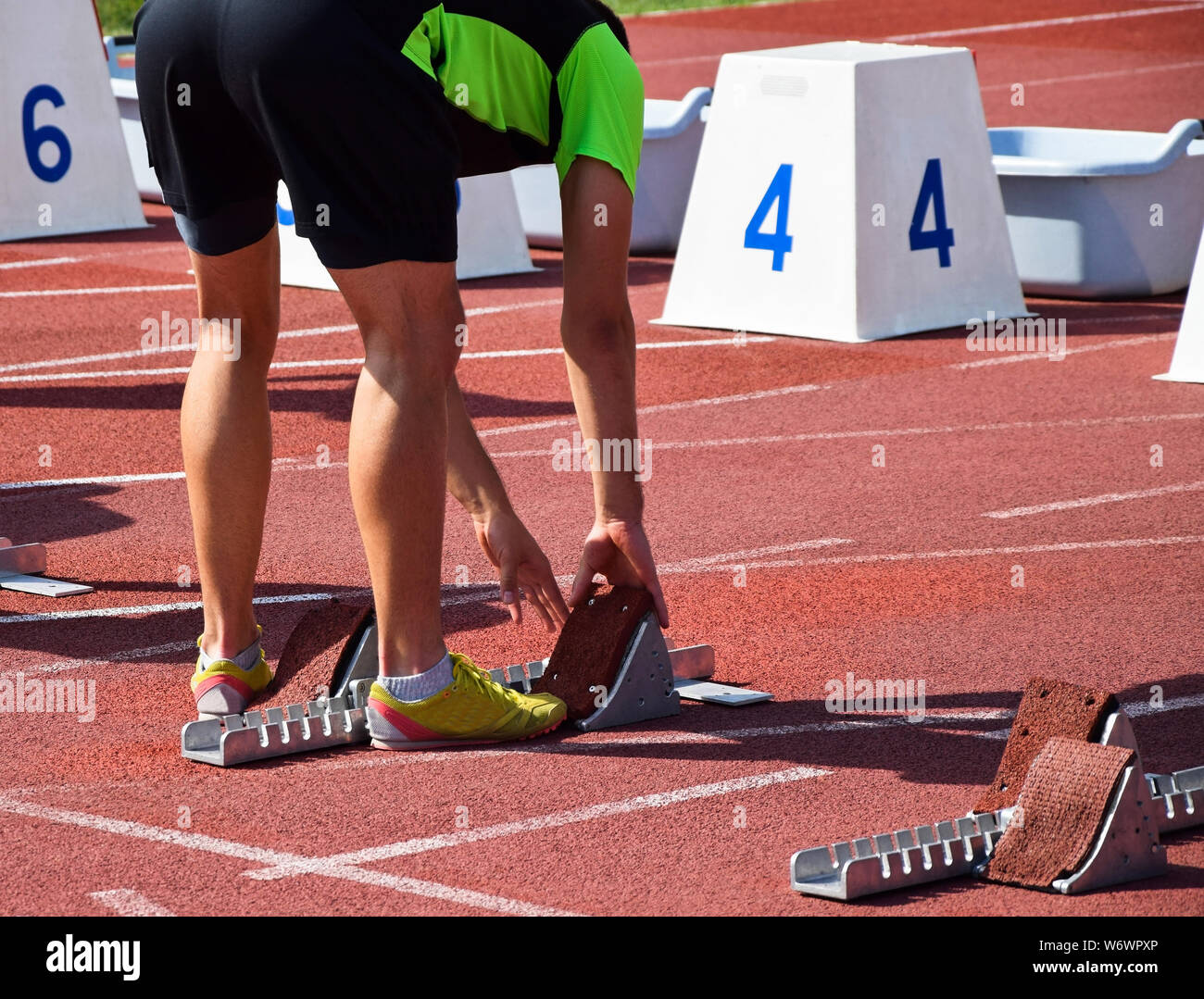 Starting line of the running race track Stock Photo - Alamy