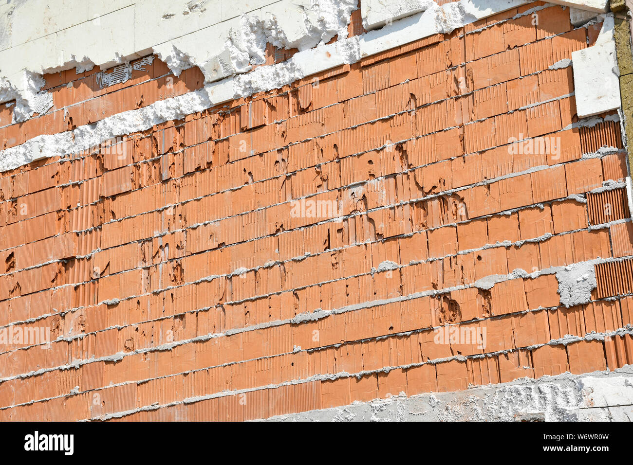 Brick wall of an apartment building under construction Stock Photo - Alamy
