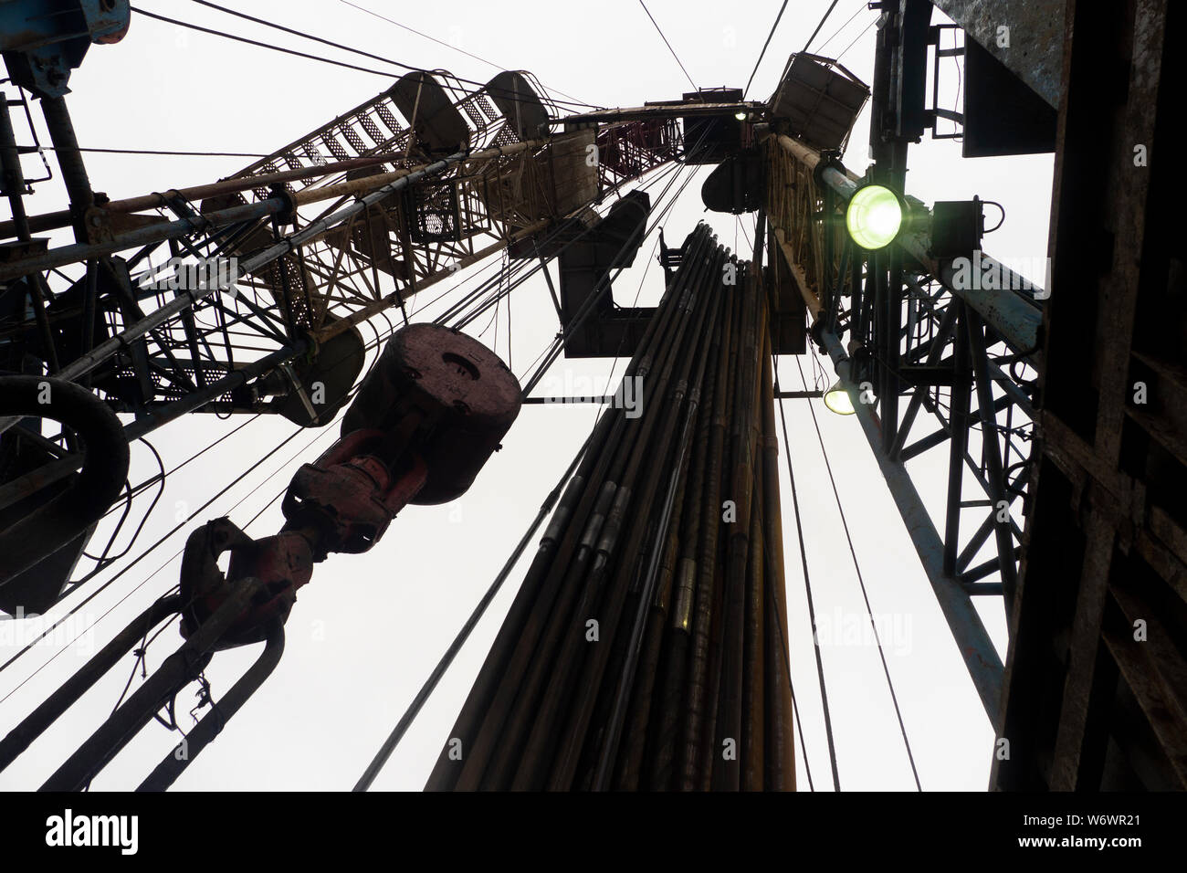 Oil and Gas Drilling Rig onshore dessert with dramatic cloudscape. Oil ...