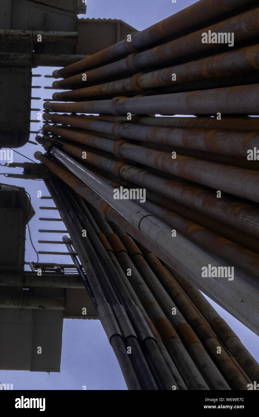Oil and Gas Drilling Rig onshore dessert with dramatic cloudscape. Oil ...