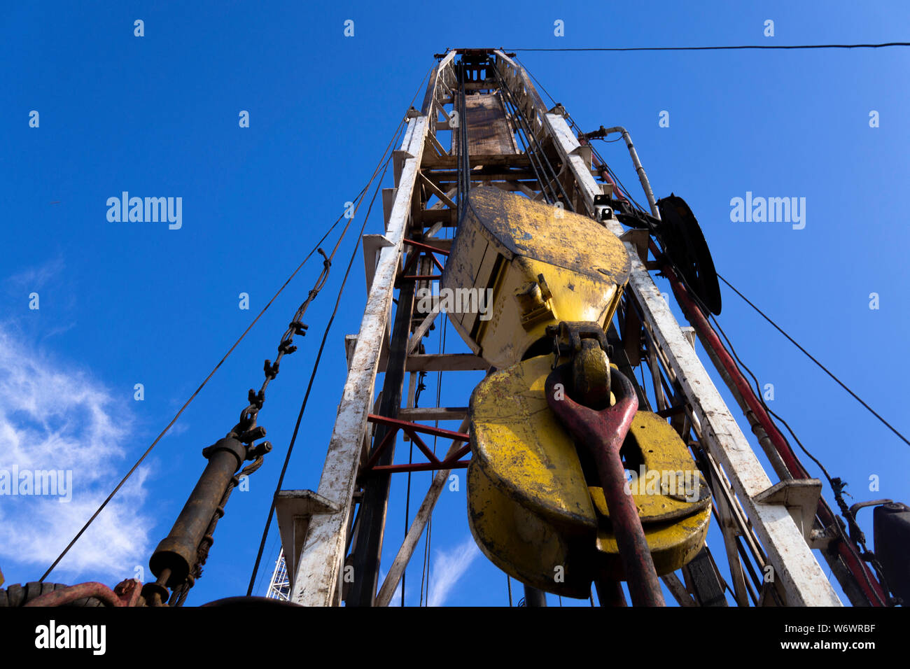 Oil and Gas Drilling Rig onshore dessert with dramatic cloudscape. Oil ...
