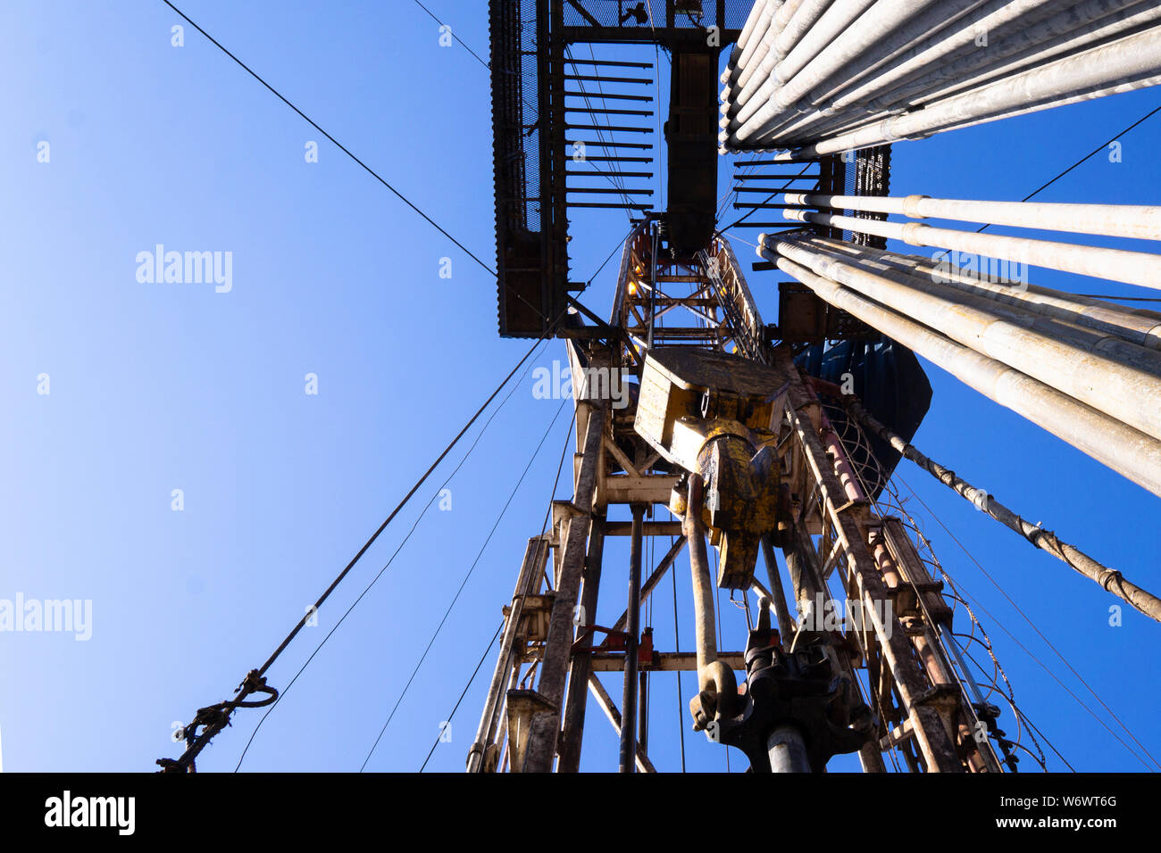 Oil and Gas Drilling Rig onshore dessert with dramatic cloudscape. Oil ...