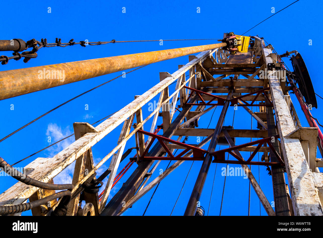 Oil and Gas Drilling Rig onshore dessert with dramatic cloudscape. Oil ...