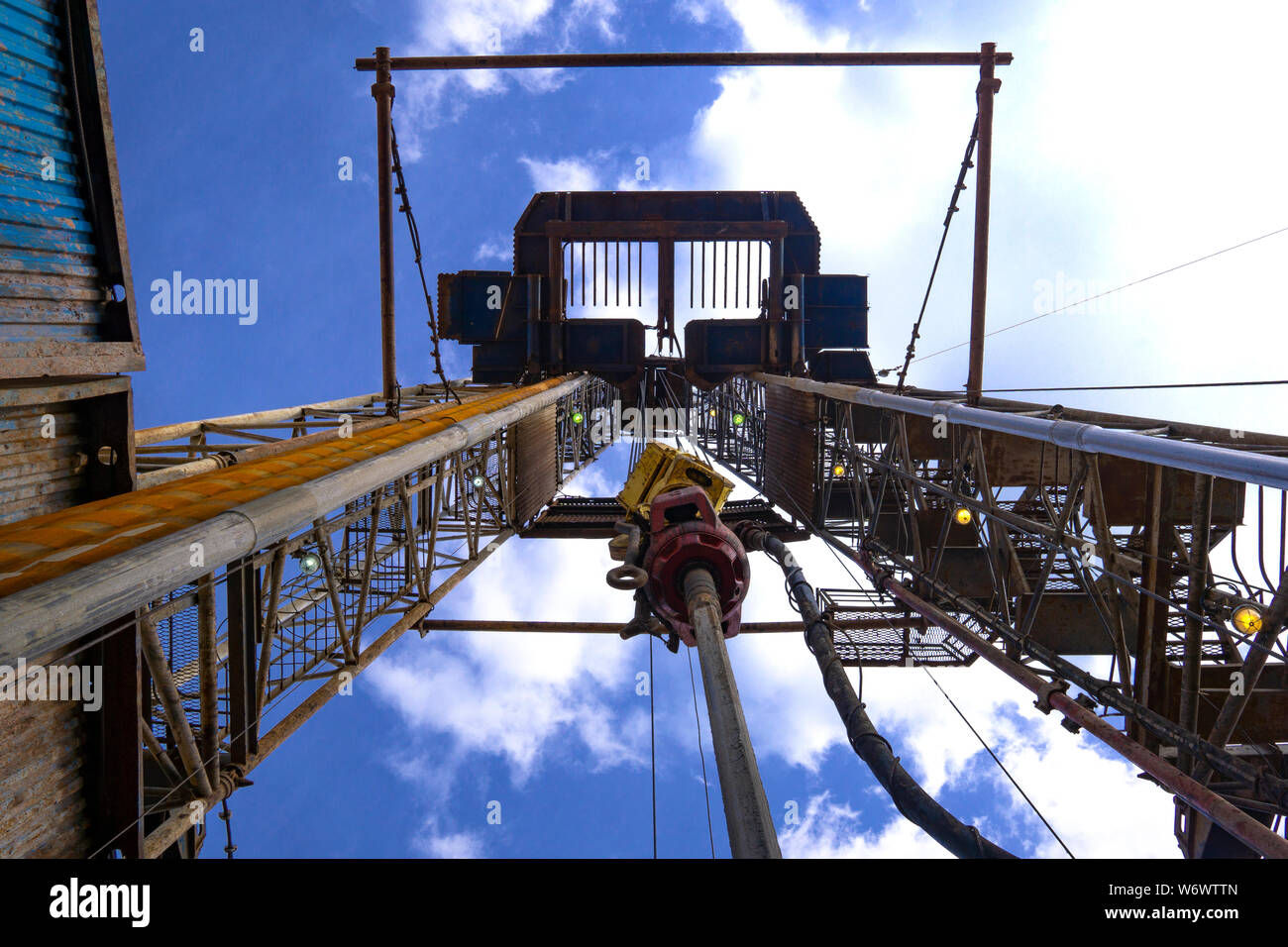 Oil and Gas Drilling Rig onshore dessert with dramatic cloudscape. Oil ...