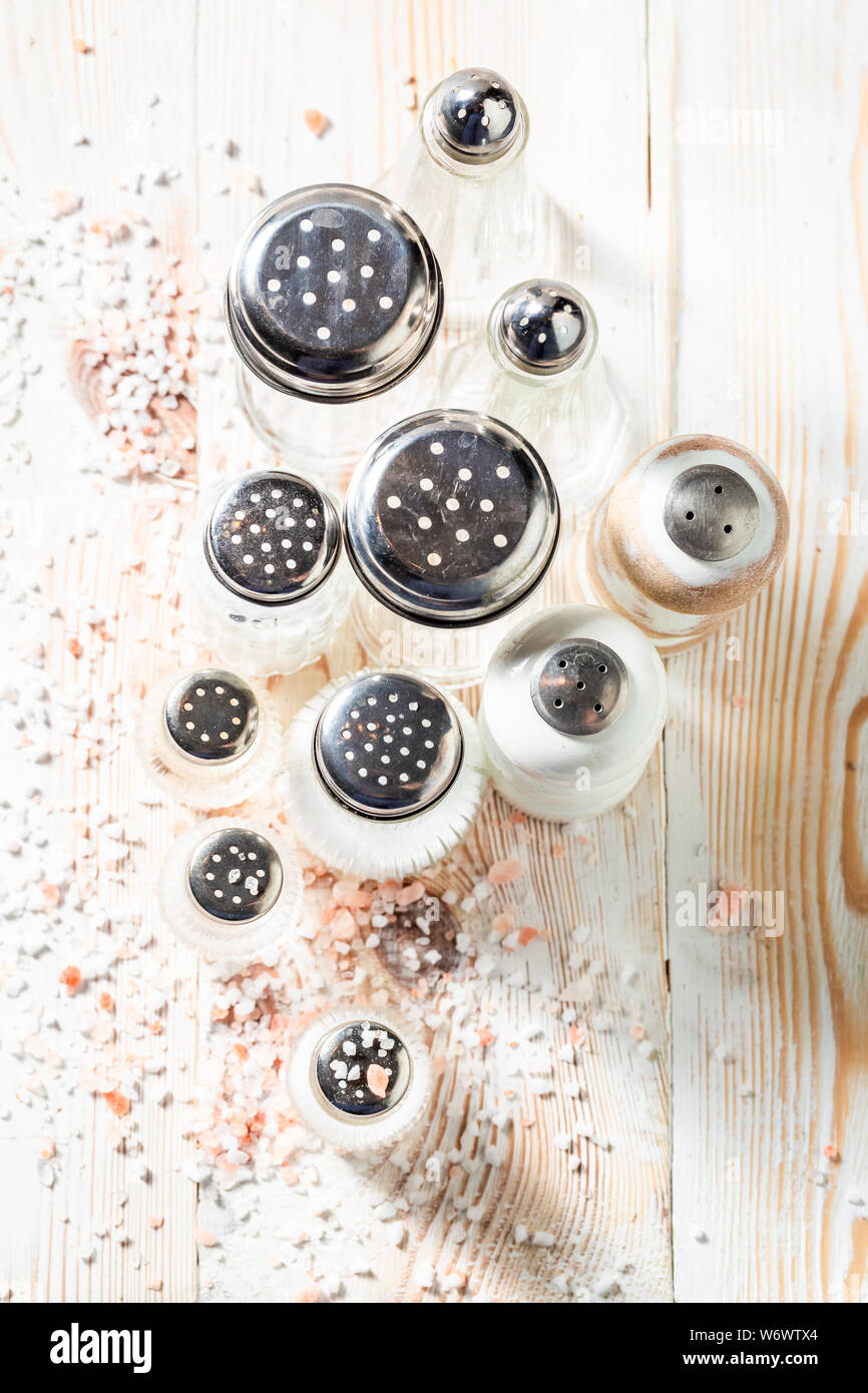 Salt in salt shaker with different types of salt Stock Photo - Alamy