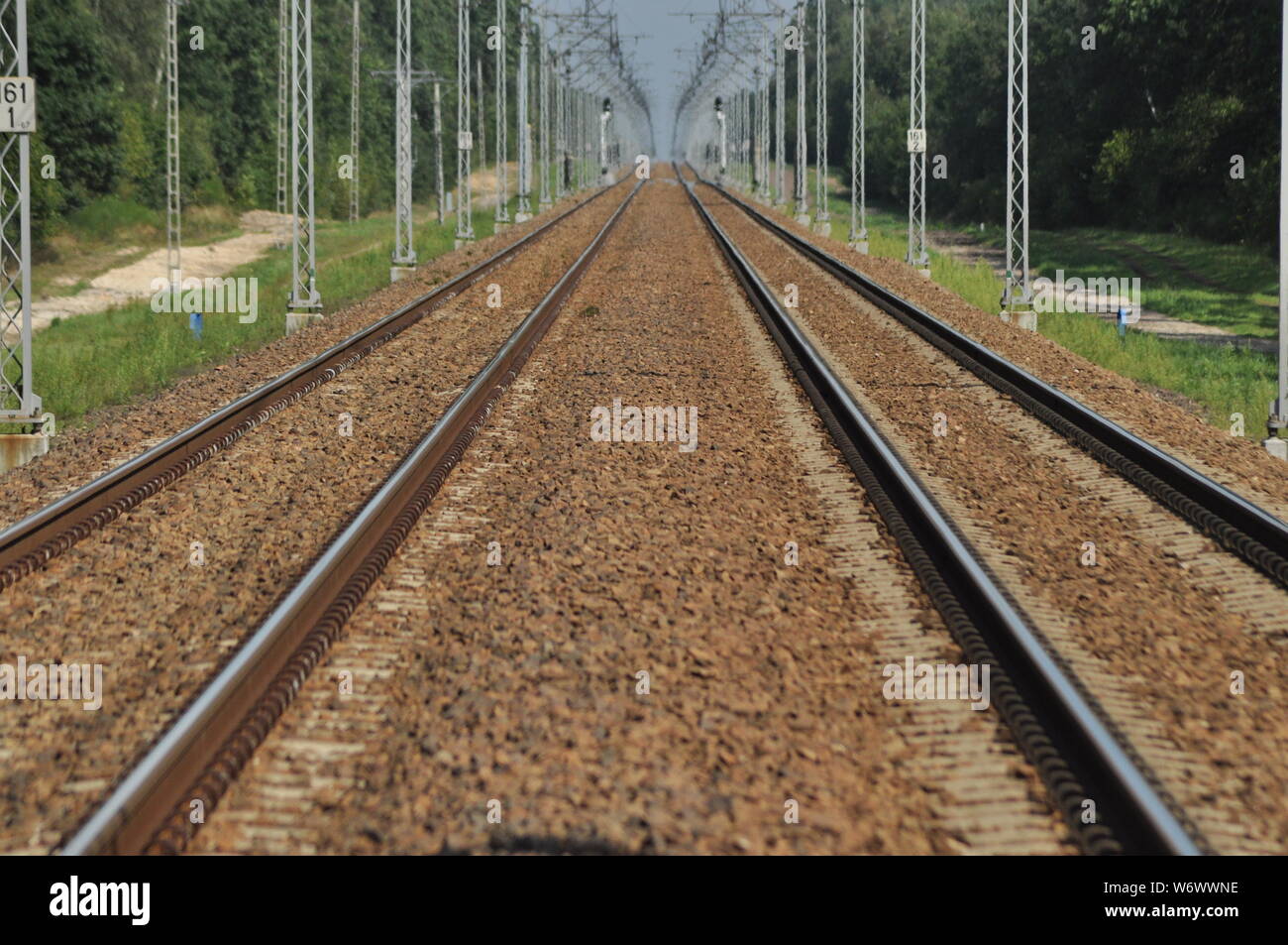 The railway line. Electric traction. Tracks for trains Stock Photo - Alamy