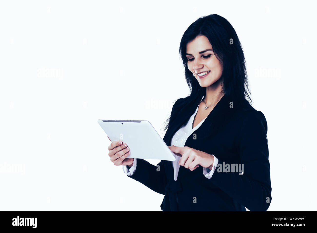 Young, attractive, successful business woman studying a business plan ...