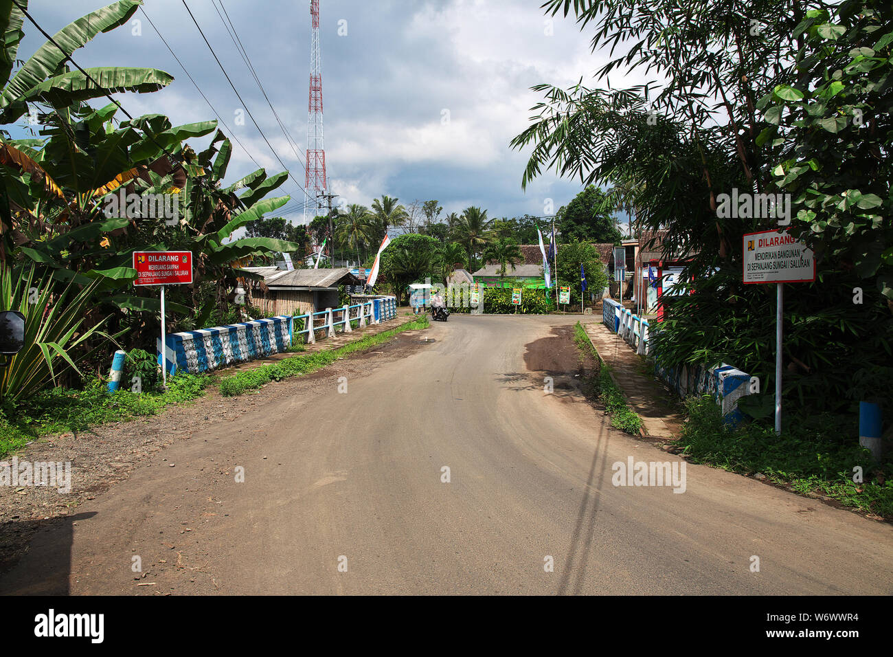 The road on rice fields in village of Indonesia Stock Photo - Alamy