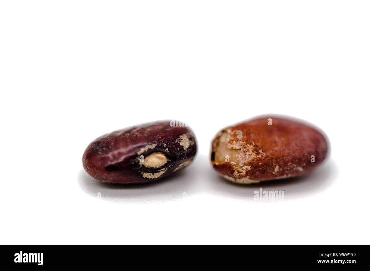 ugly red beans on a white background isolated Stock Photo - Alamy