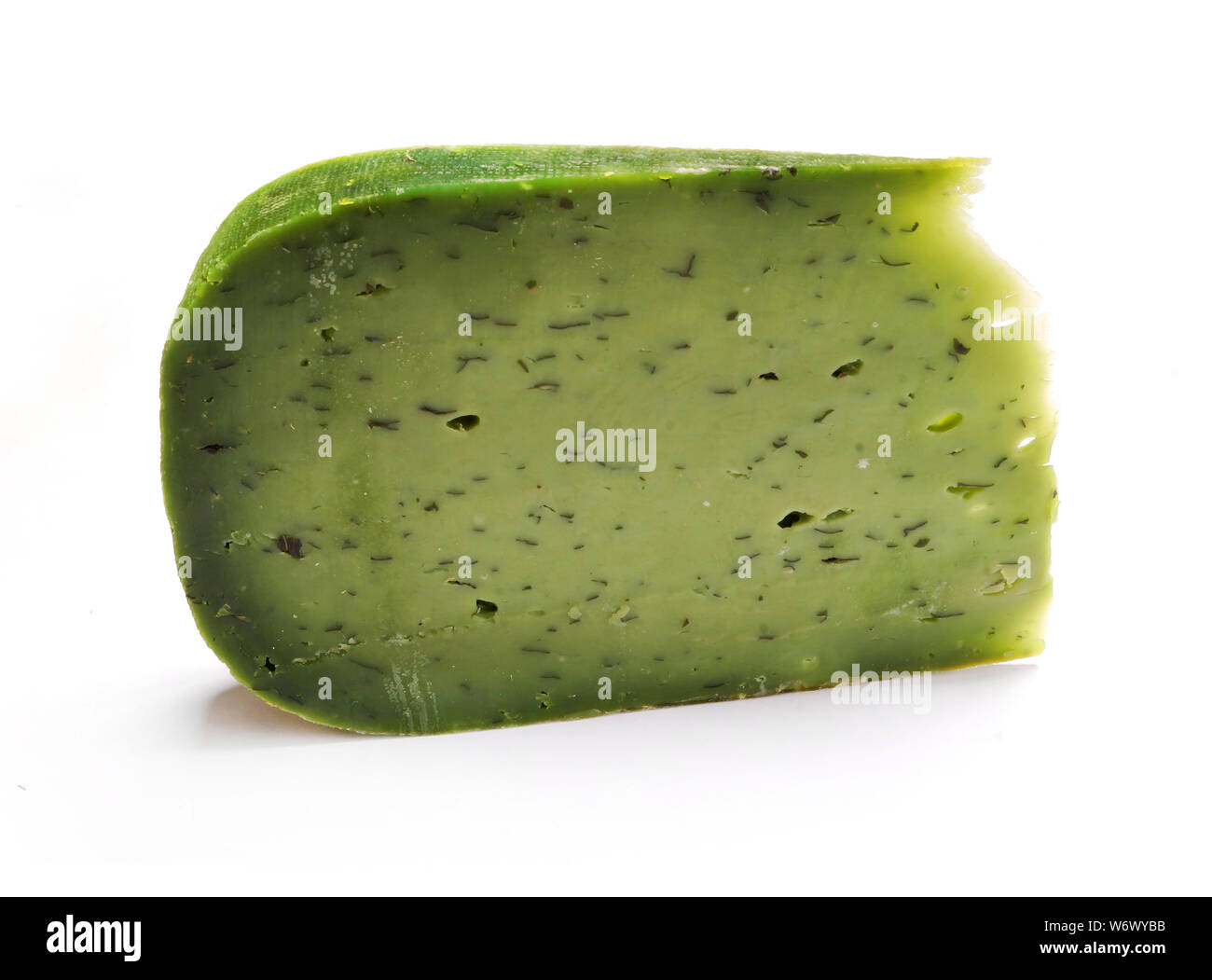 Dutch green cheese on a white background. Pesto Rosso on a white ...