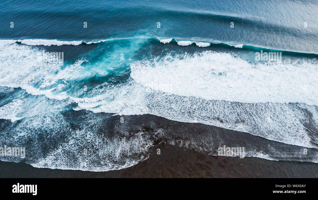 Aerial view of huge ocean waves. Panoramic drone photo. Blue background ...