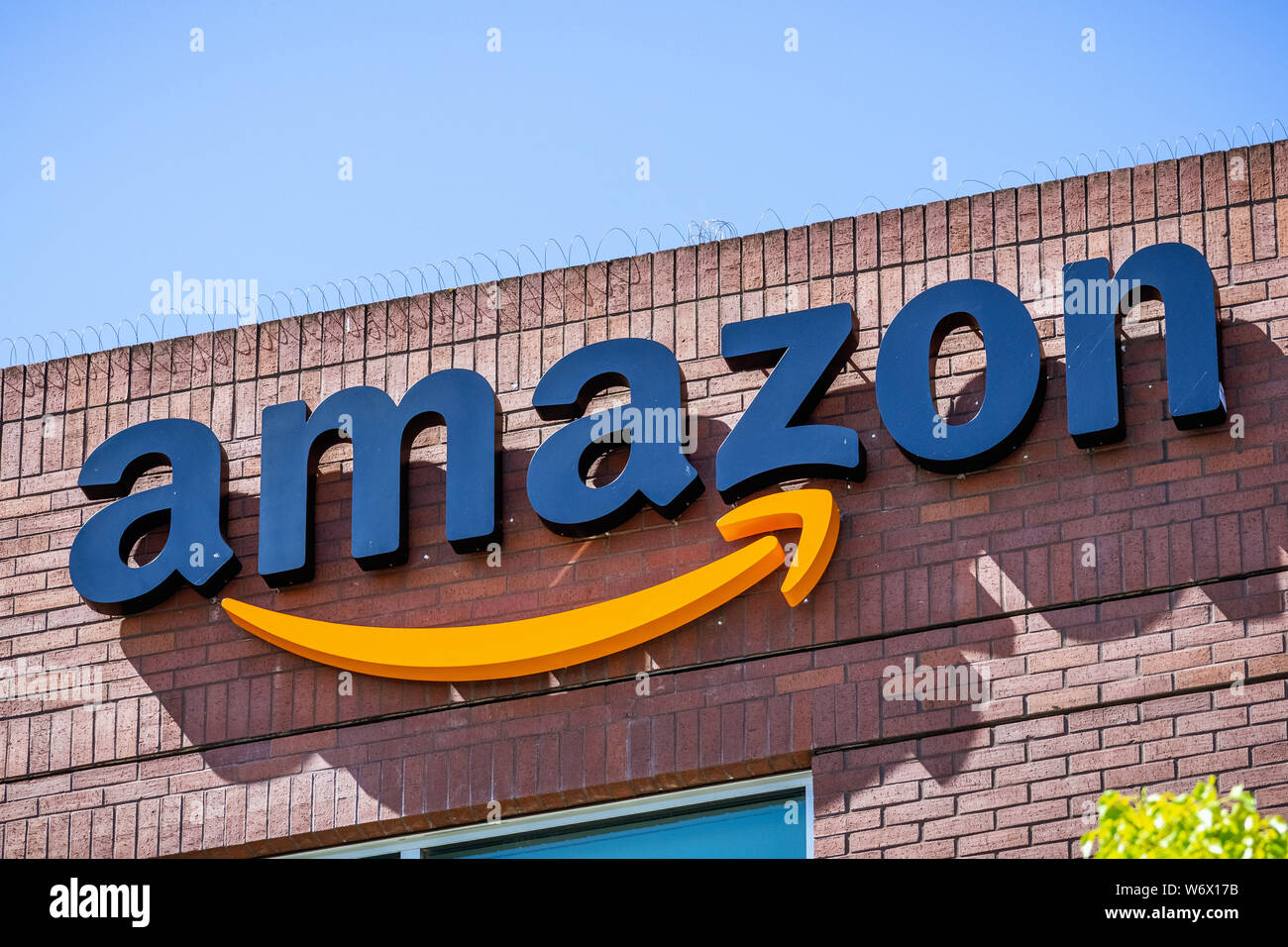 July 26, 2019 Palo Alto / CA / USA - Amazon logo on the facade of one ...