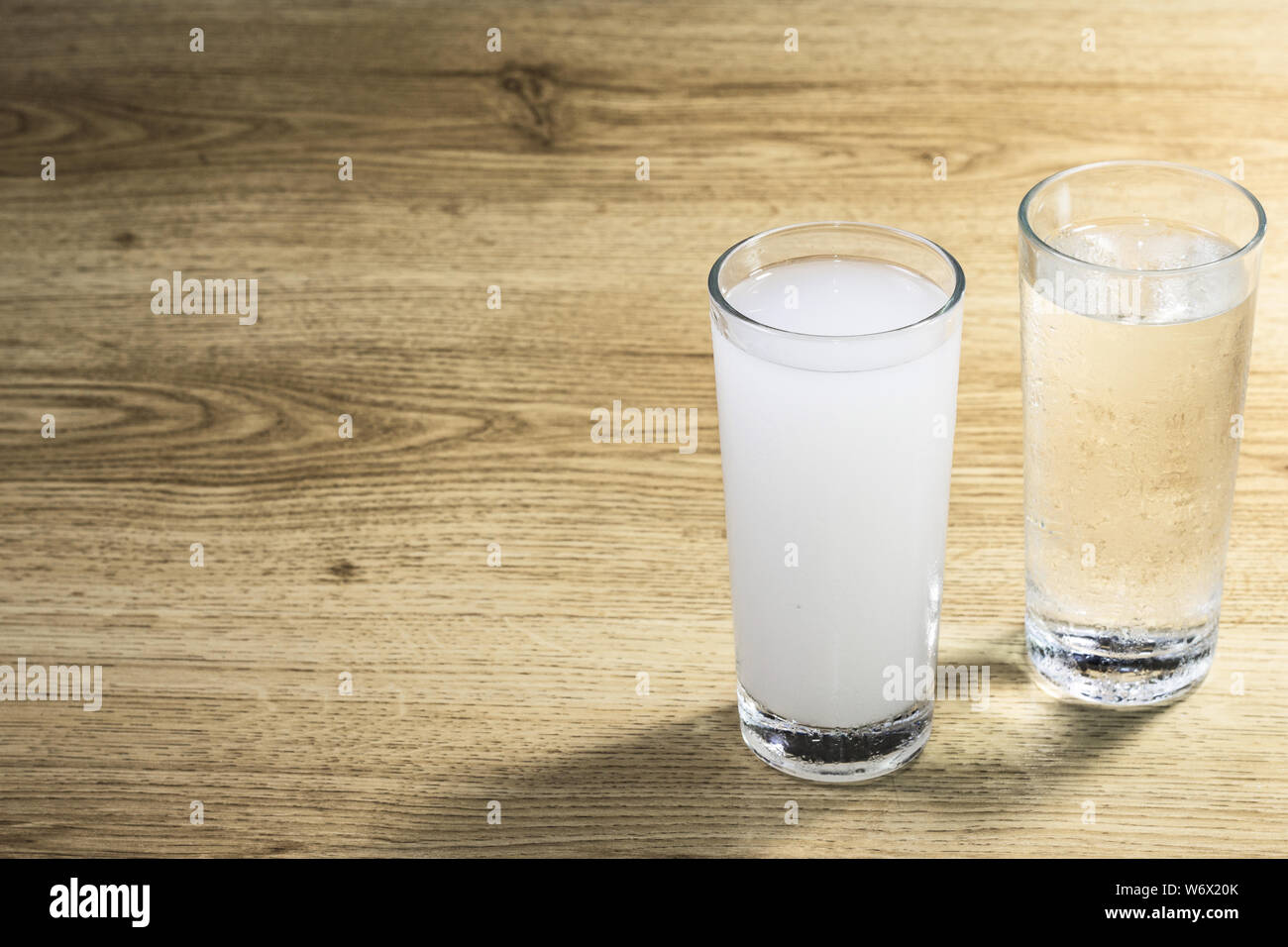 Turkish raki on wooden table Stock Photo - Alamy