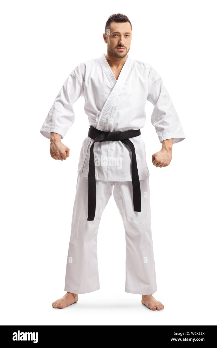 Full length portrait of a man in karate kimono with black belt isolated ...