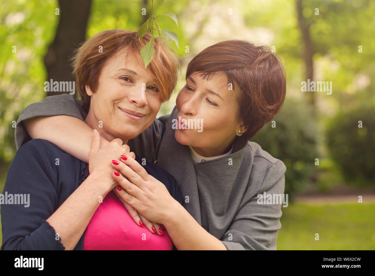 Women walking in the park hi-res stock photography and images - Alamy