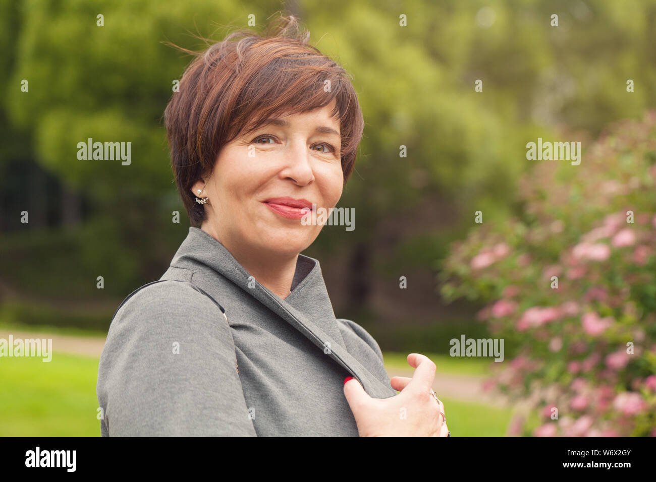 Beautiful mature woman outdoor hi-res stock photography and images - Alamy