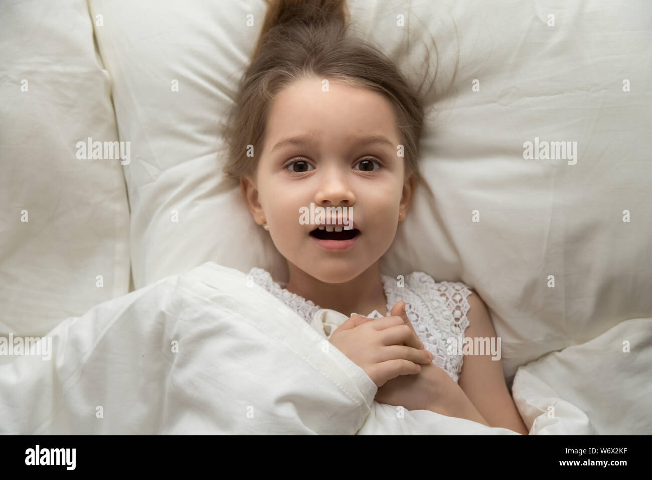 Child scared bed hi-res stock photography and images - Alamy