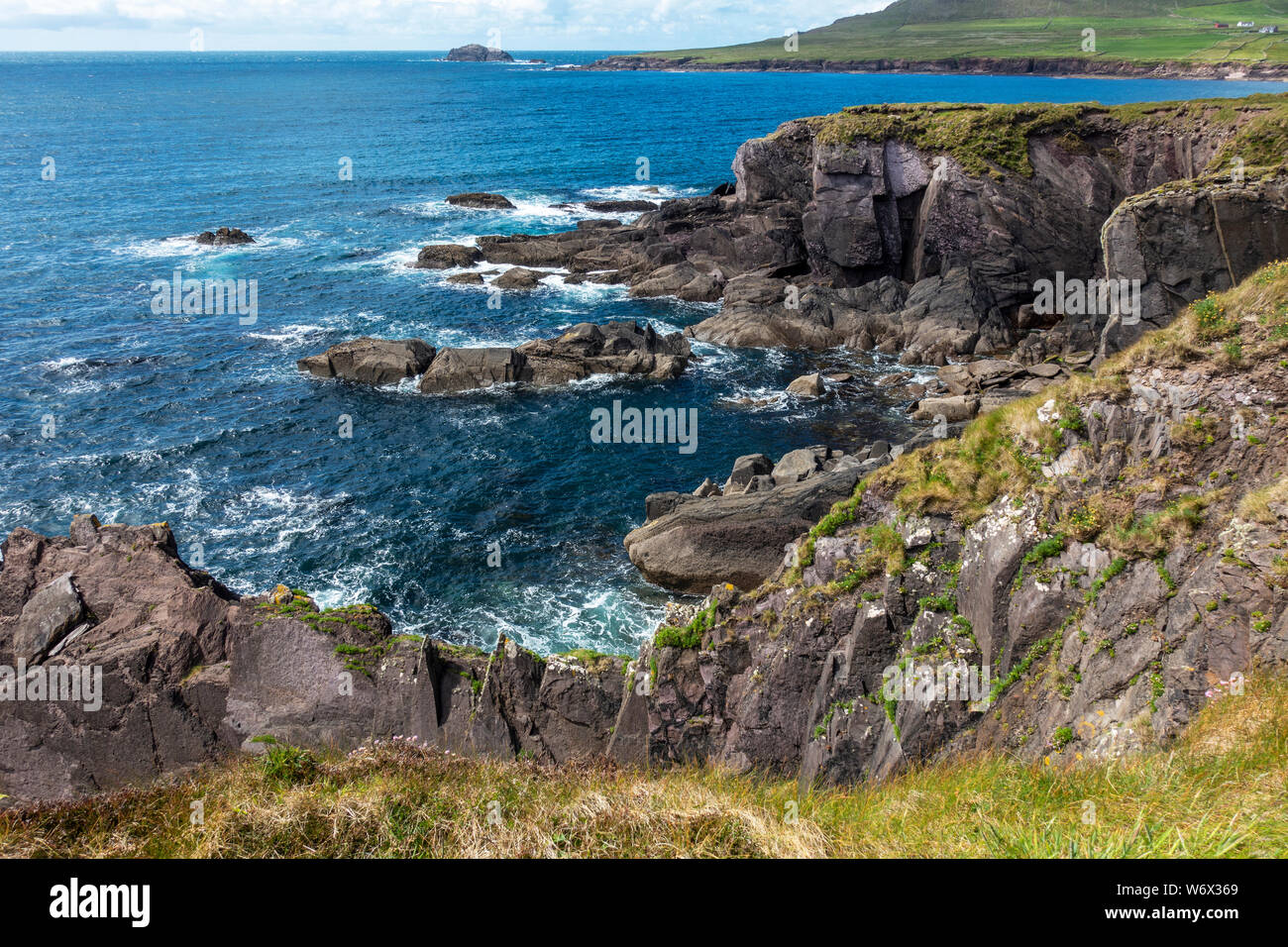Rugged sea cliffs at Feohanagh on Slea Head Drive on the Dingle ...