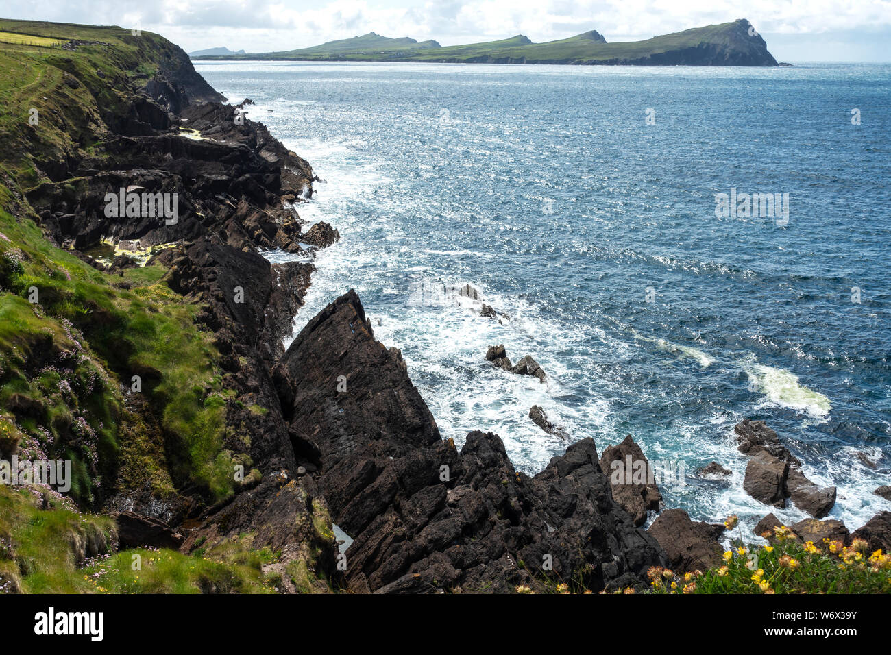 Rugged sea cliffs at Feohanagh on Slea Head Drive on the Dingle ...