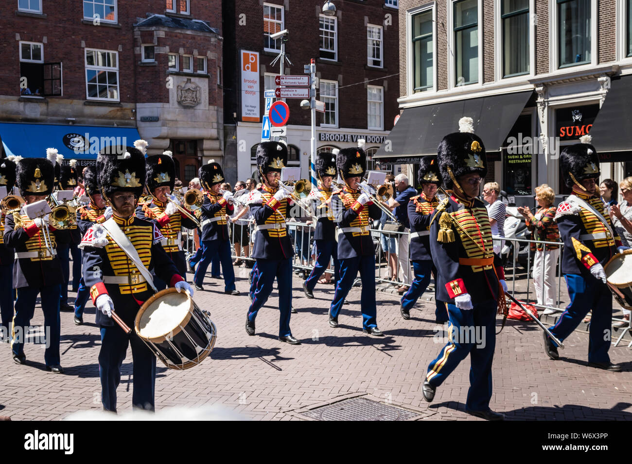 Military orchestra in traditional ceremonial uniform performing and ...