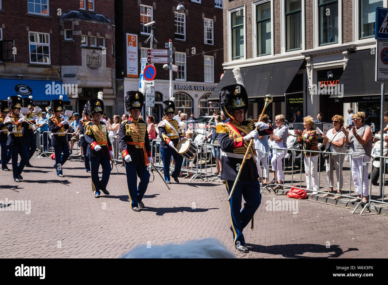 Military orchestra in traditional ceremonial uniform performing and ...