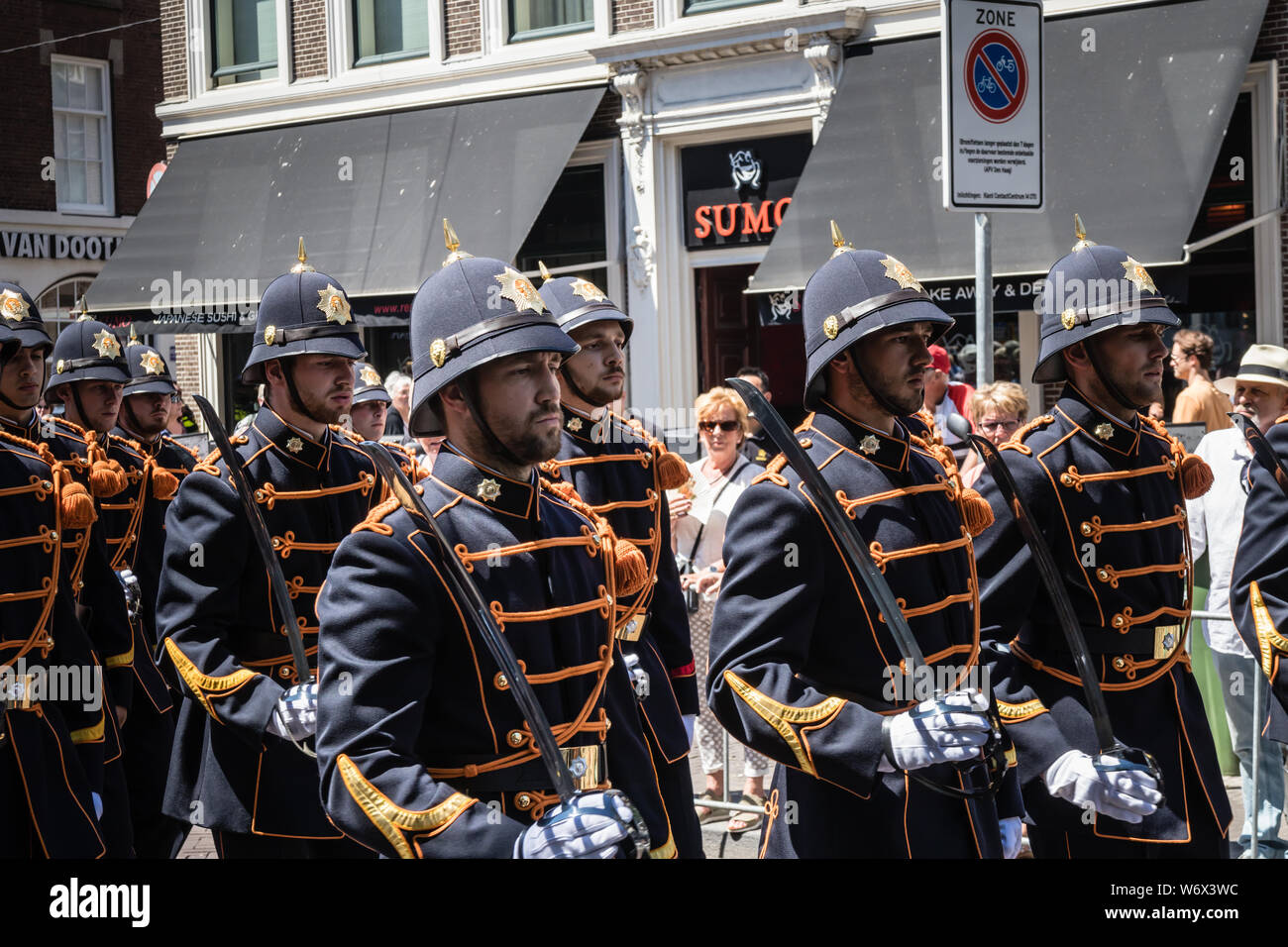 Men in Dutch cavalry traditional uniform marching at the parade on the ...
