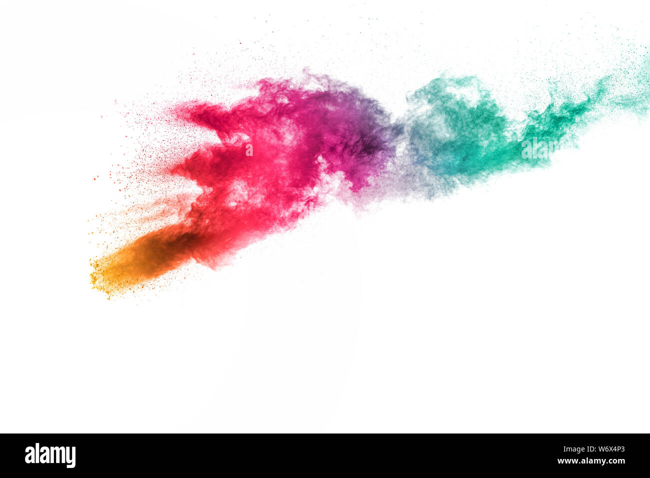 Abstract multi color powder explosion on white background.Freeze motion ...