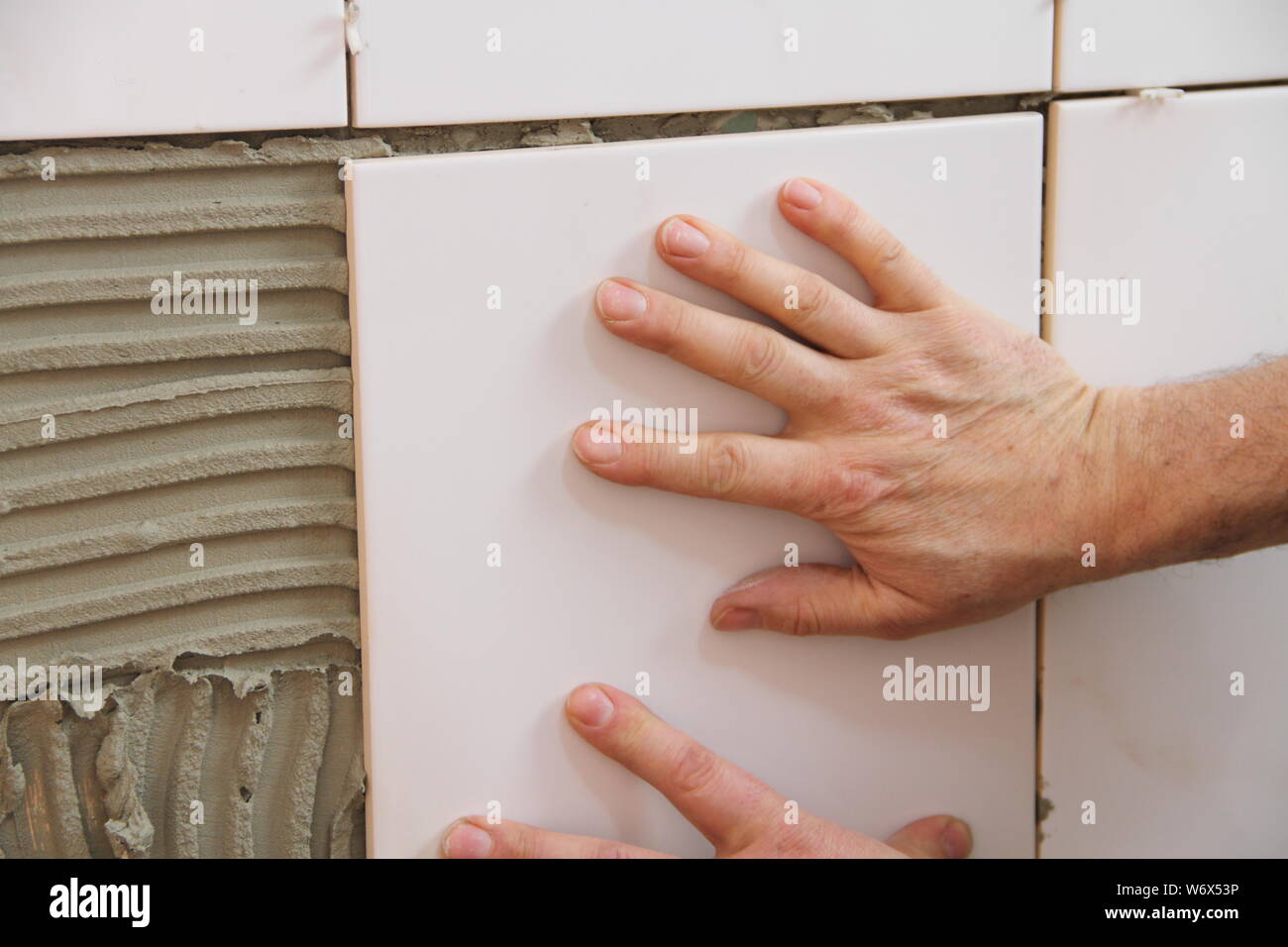 Tiler at work Stock Photo - Alamy