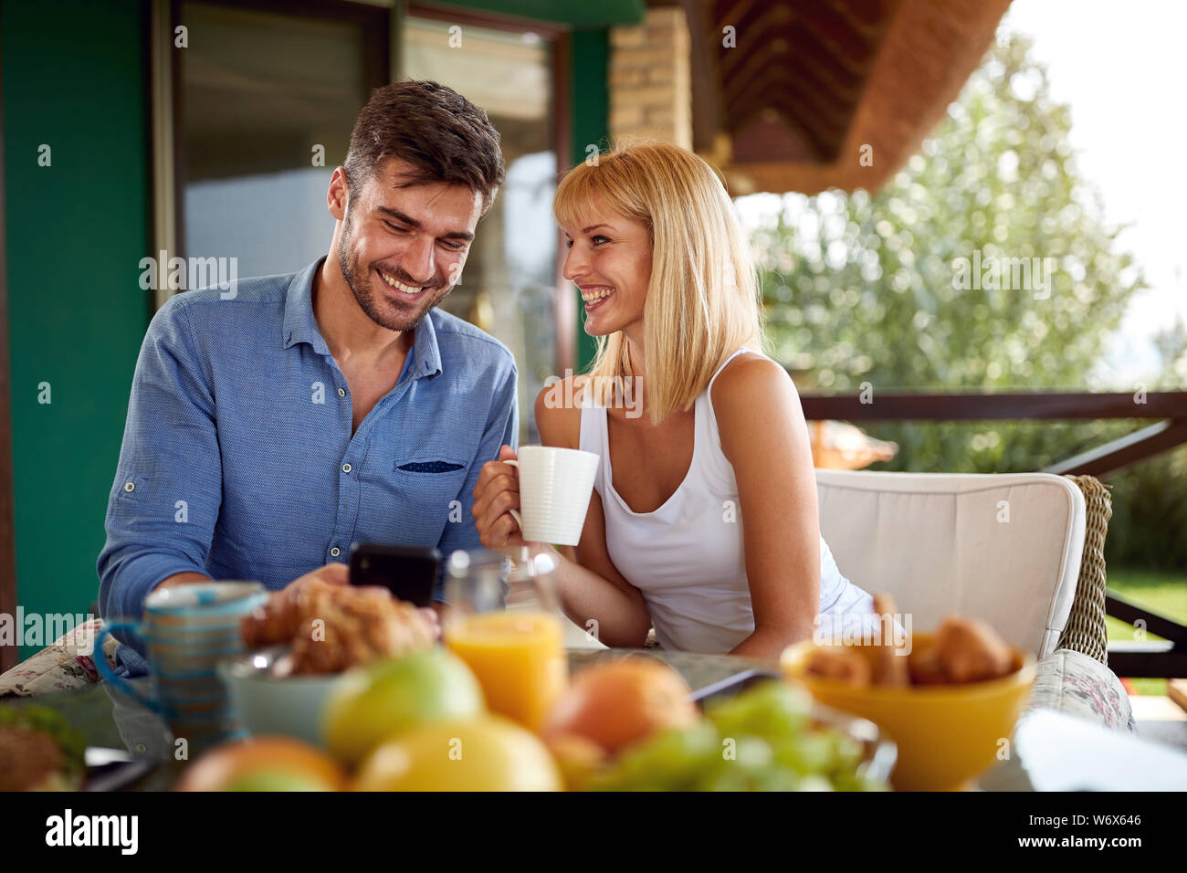 Couple breakfast terrace hi-res stock photography and images - Alamy