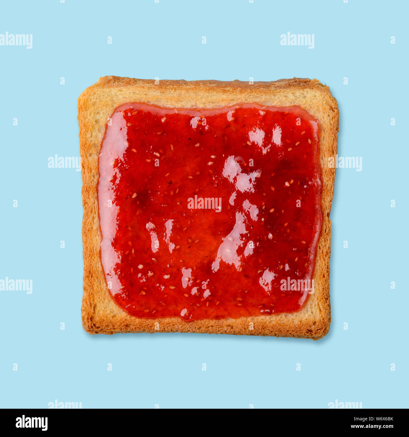 Toast with raspberry jam Stock Photo - Alamy